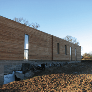 The Scots pine cladding is unveiled - Build It