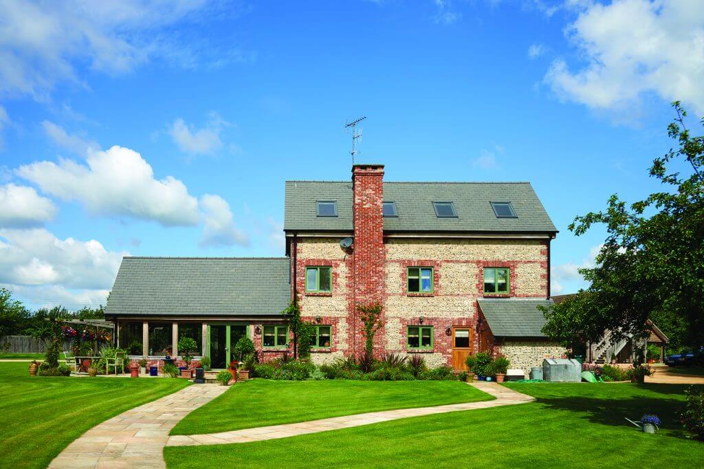 Timber & Flint-Clad Oak Frame Home with Rustic Interior