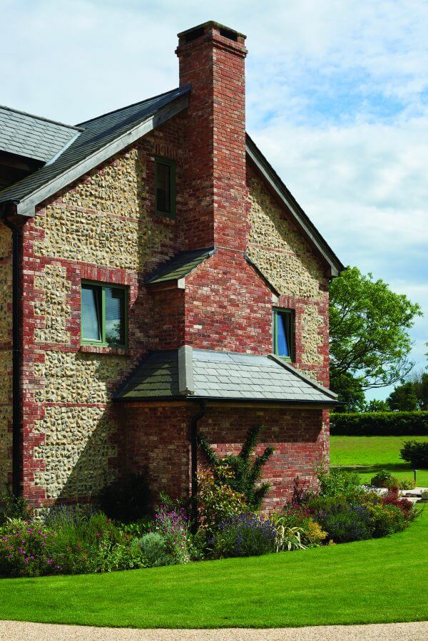 Timber & Flint-Clad Oak Frame Home with Rustic Interior