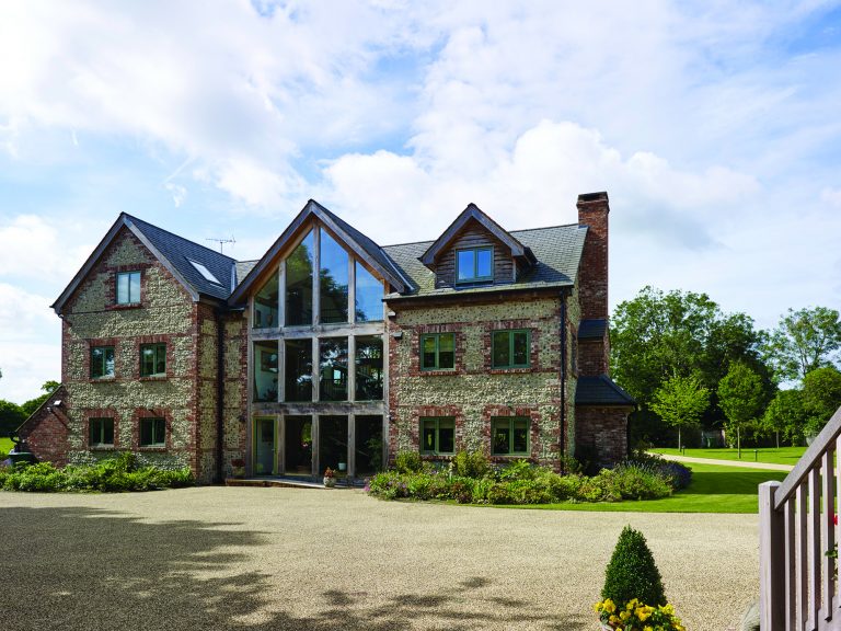 Timber & Flint-Clad Oak Frame Home with Rustic Interior